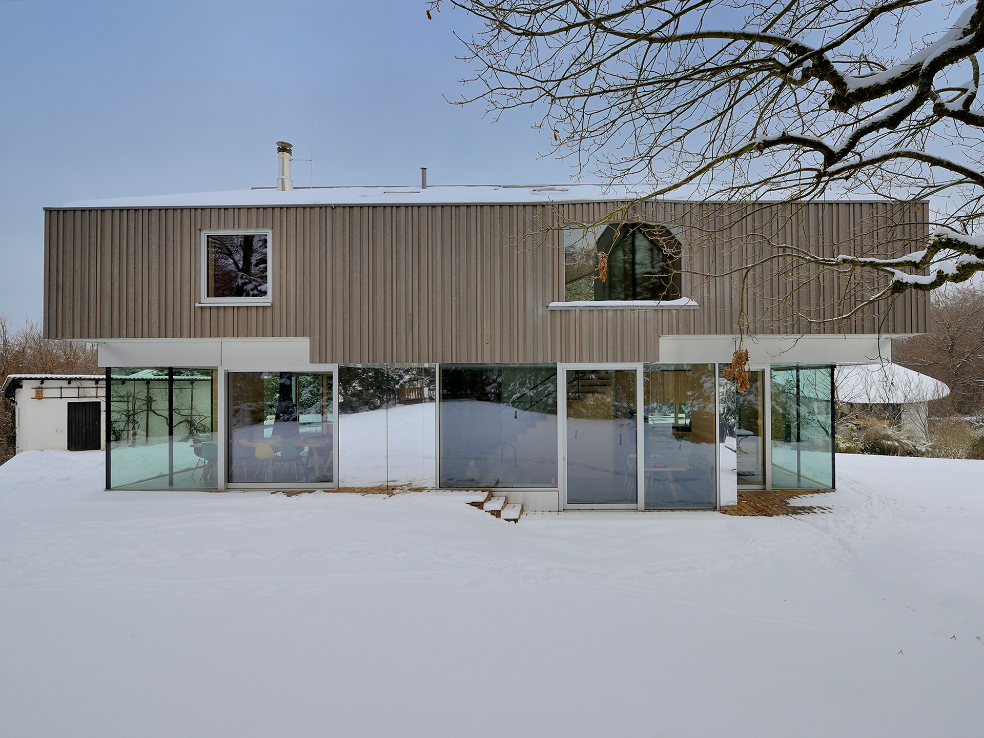 Frameweb | A top-heavy house by HHF hides a secret