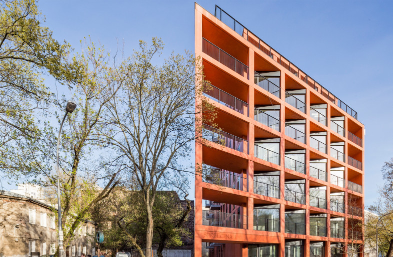 Frameweb | BBGK highlights Polish prefabrication in brick-red concrete